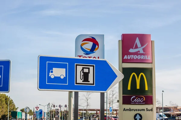 Road signs at Total gas service station – Stock Editorial Photo ...