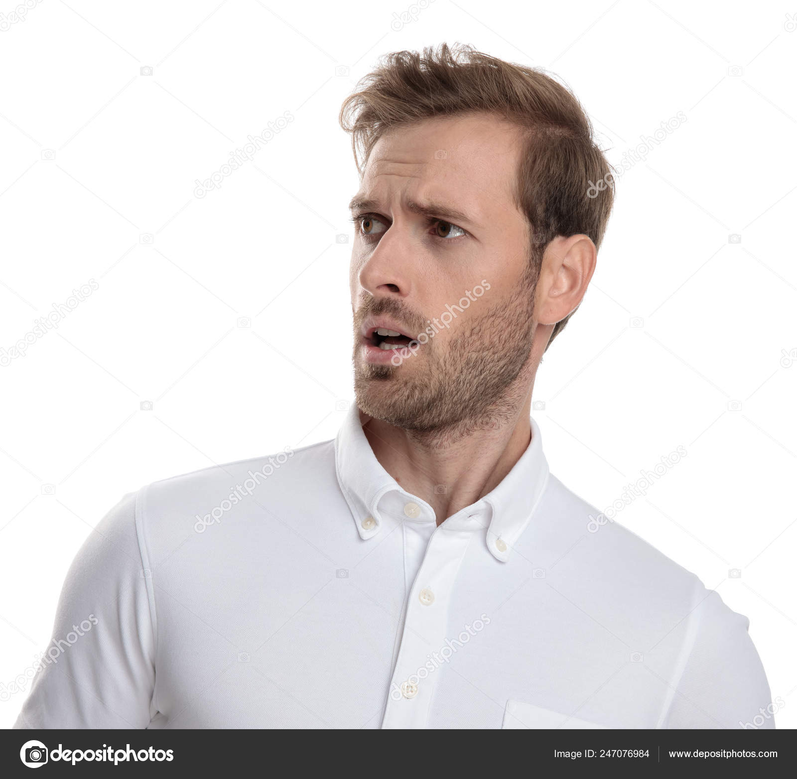 Shocked Young Man Looks Side White Background Stock Photo by ©feedough ...