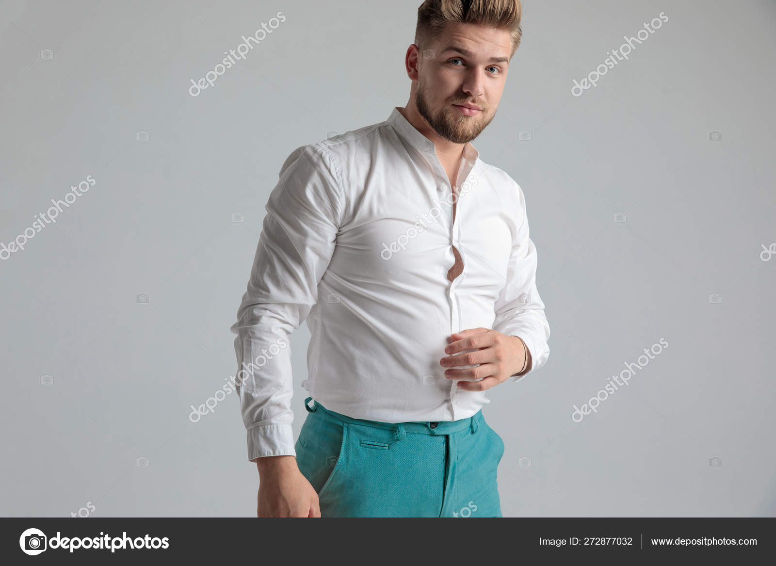 Charismatic chubby guy standing and looking to the camera Stock Photo ...