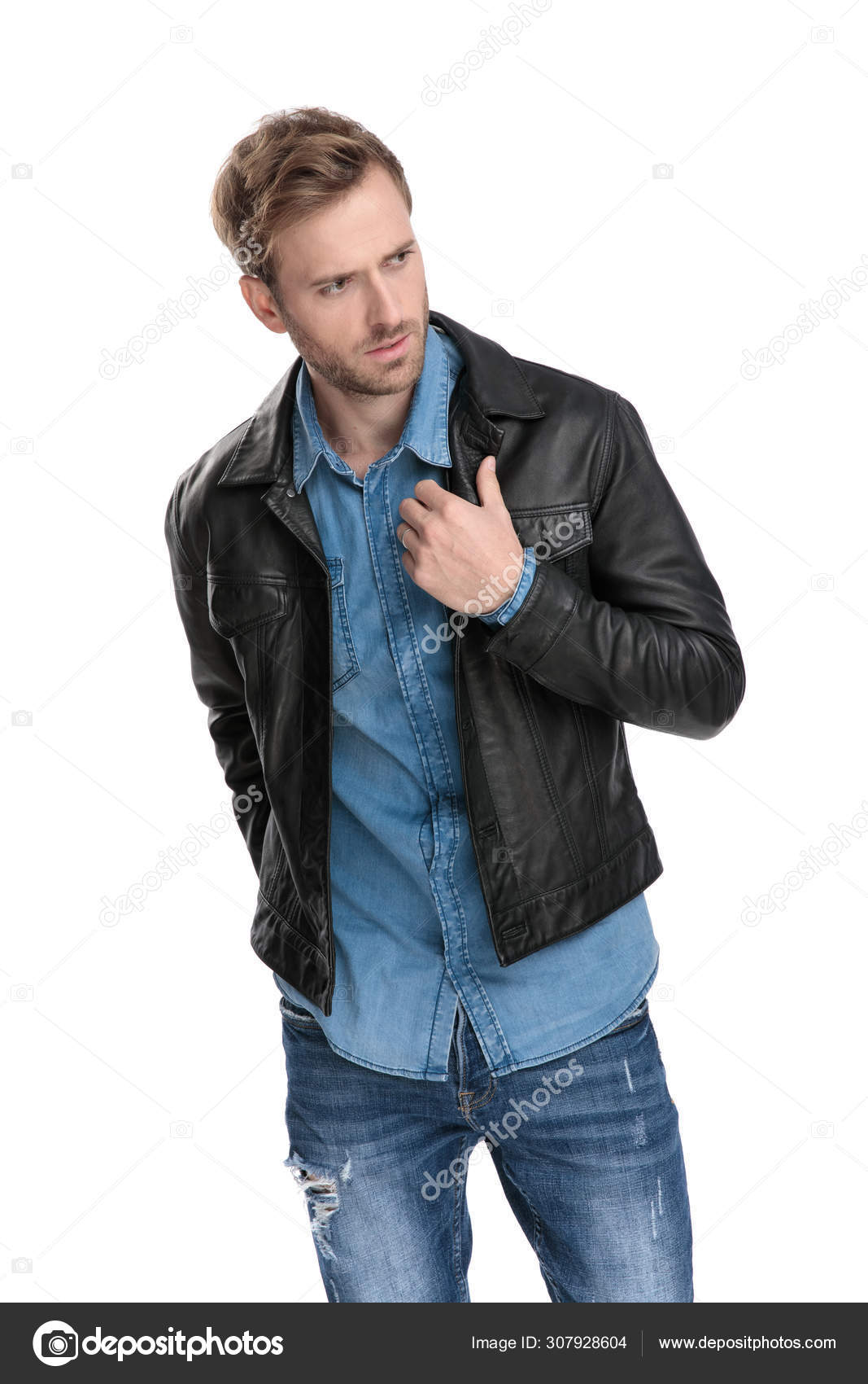 Man holding his collar and looking away Stock Photo by ©feedough 307928604