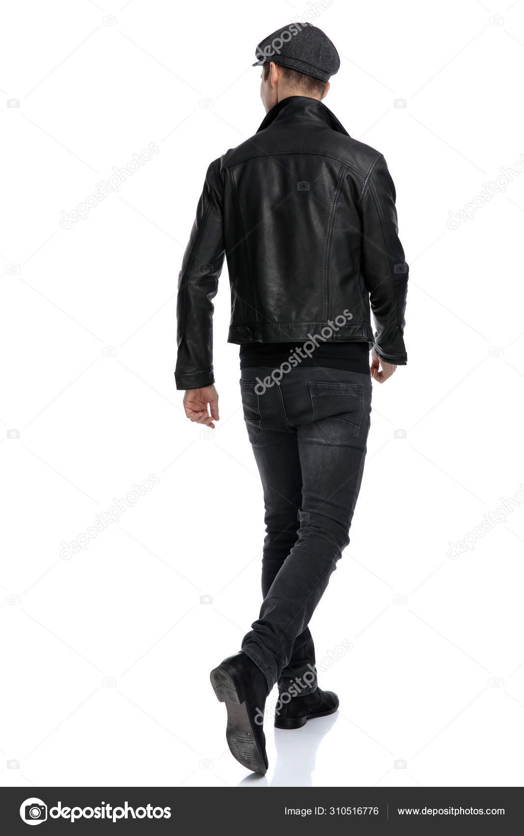 Casual man walking one way and looking the other ⬇ Stock Photo, Image ...