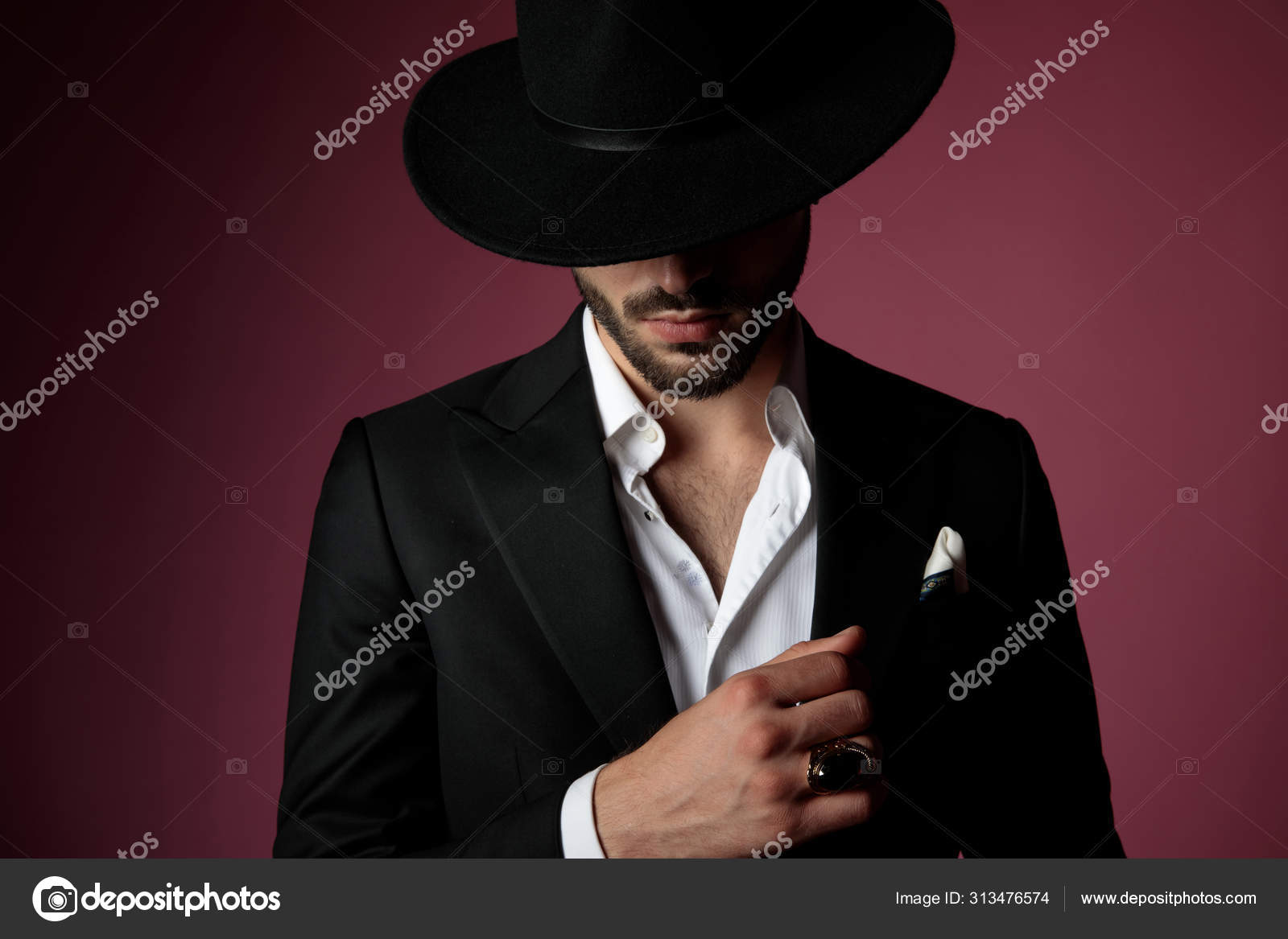 Confident man showing his ring Stock Photo by ©feedough 313476574
