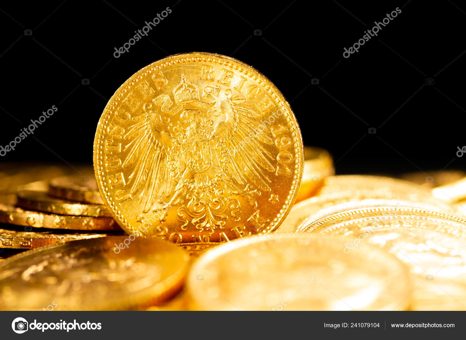 Real Gold Coins Dark Background Stock Photo by ©netfalls 241079104