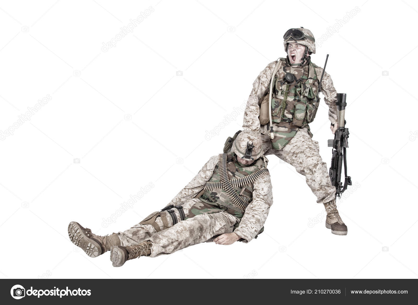 Wounded commando evacuating fellow soldier from battlefield Stock Photo ...