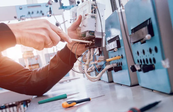 Electrician Worker Checking Electricity Meters Stock Photo by ©Romaset ...