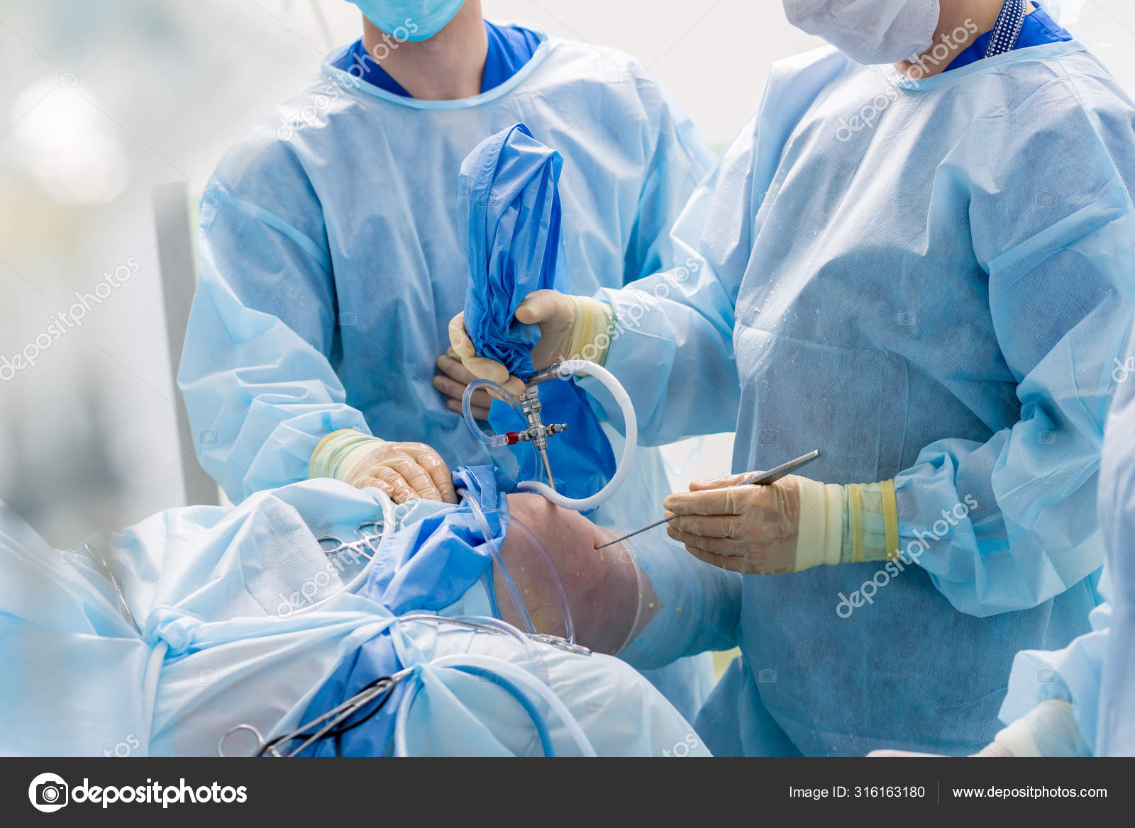 Images Of Orthopedic Doctors Using Instruments