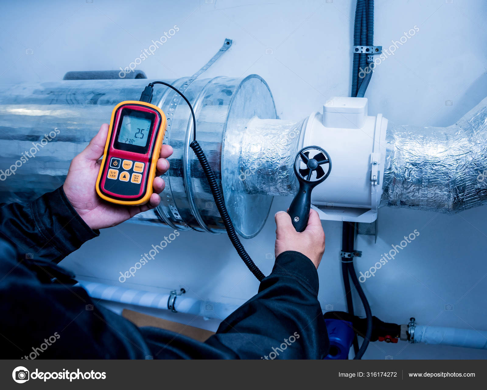 Technician Use Hand Held Anemometer Measuring Air Flowing Measurement ...