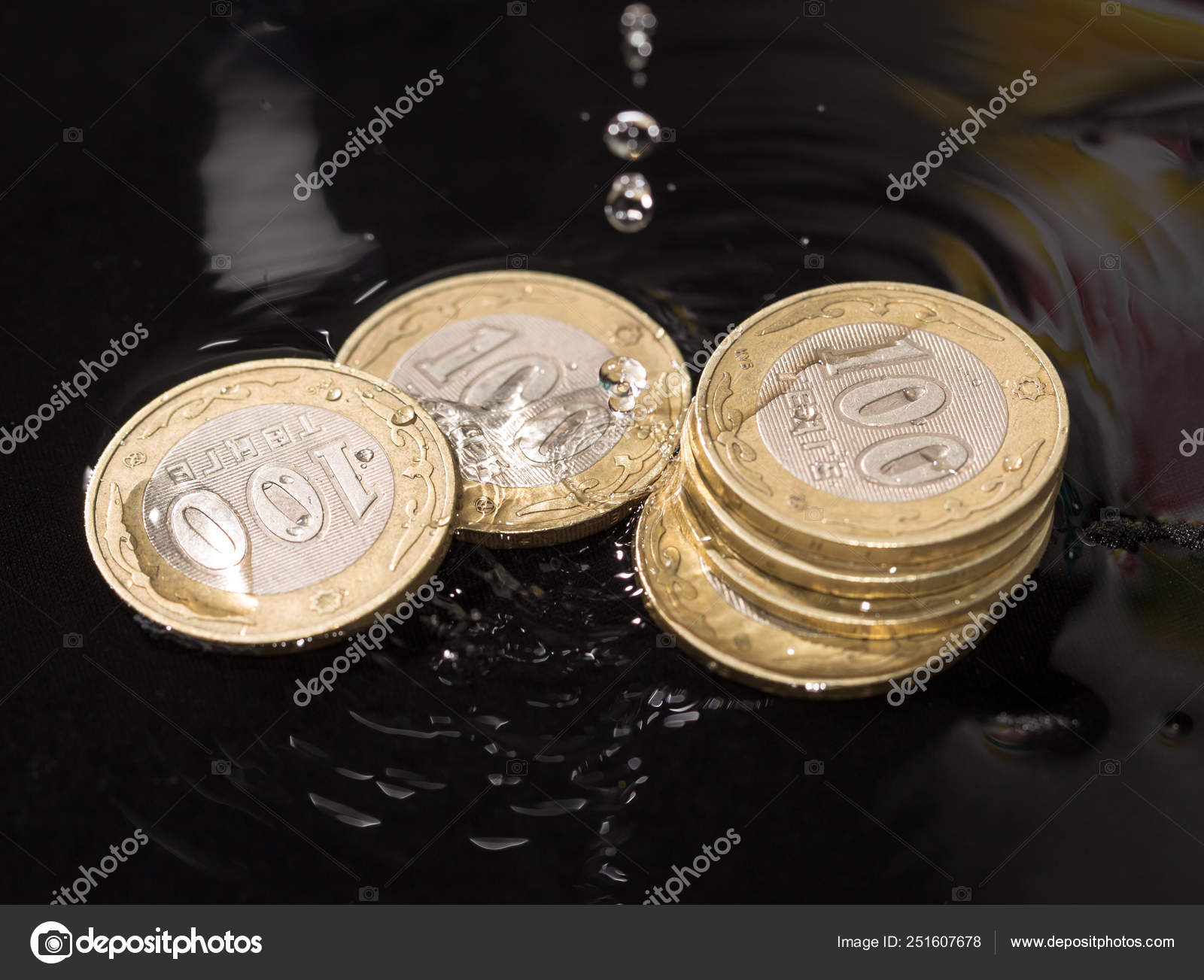 Coins in water splashes on a black background Stock Photo by ©schankz ...