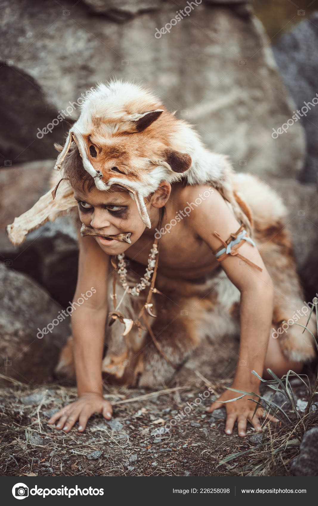 Caveman, manly boy hunting outdoors. Ancient warrior portrait. — Stock ...
