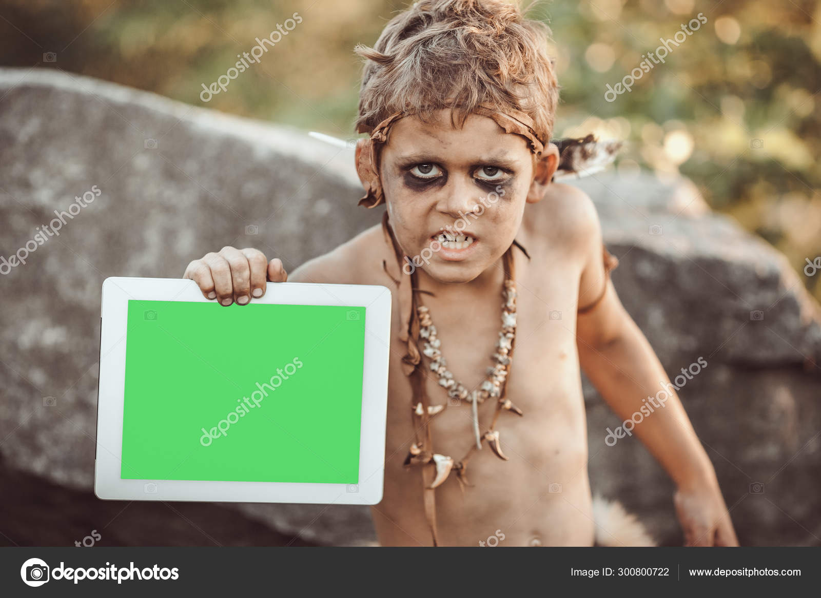 Caveman, manly boy making holding tablet PC Stock Photo by ©dimabl ...
