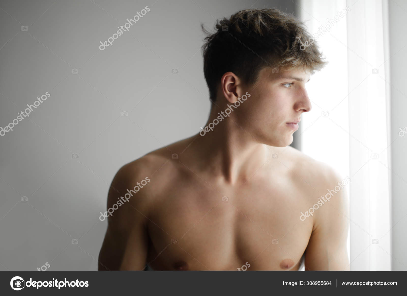 Muscled Boy Looking Window Stock Photo by ©olly18 308955684
