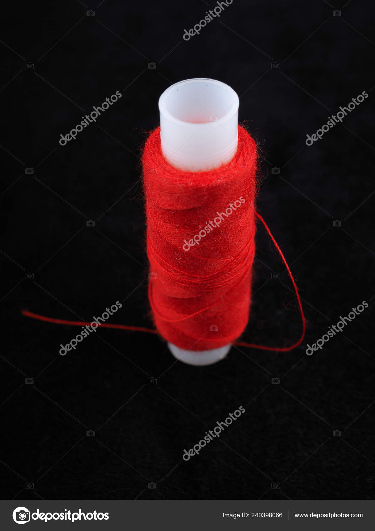 Reel Red Thread Black Background — Stock Photo © Enskanto #240398066