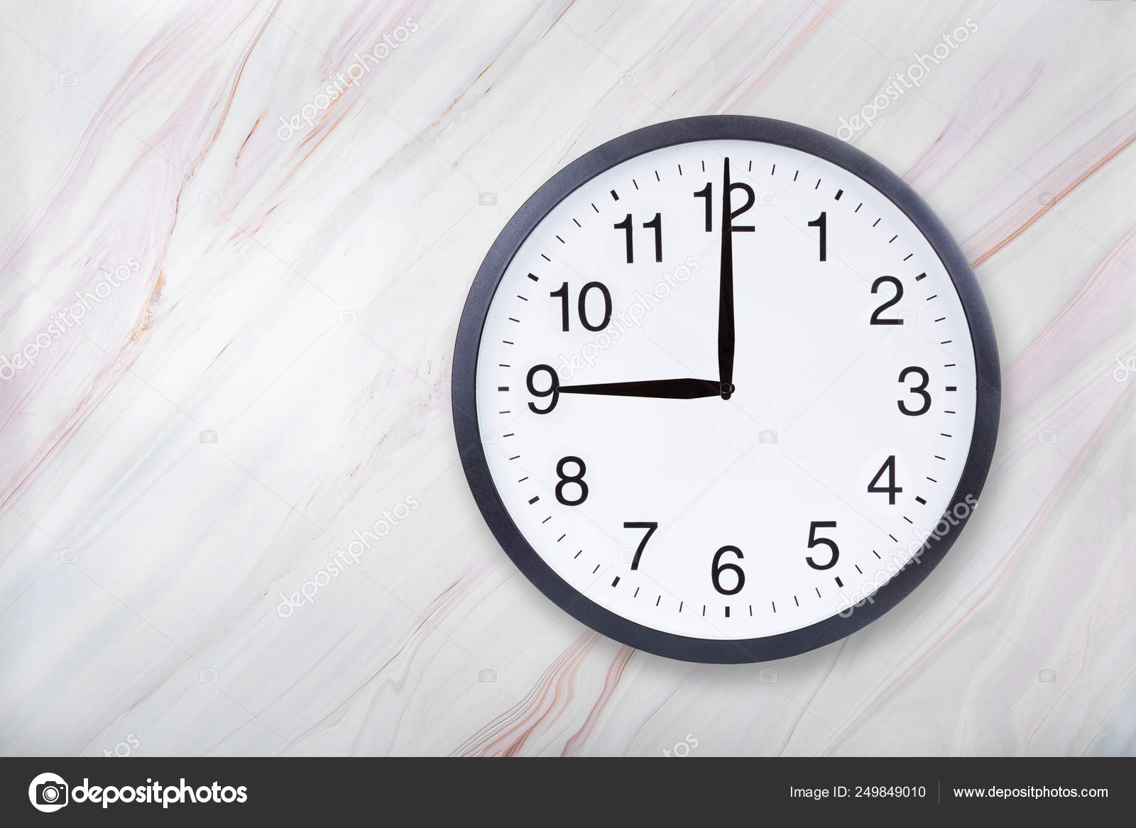 Wall clock show nine oclock on marble texture. Office clock show 9pm or ...