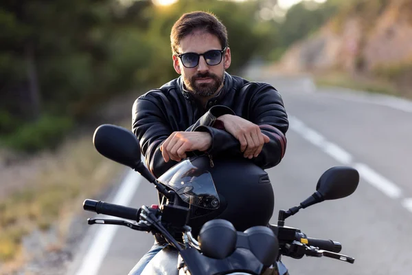 Handsome man motorcycles Stock Photos, Royalty Free Handsome man ...