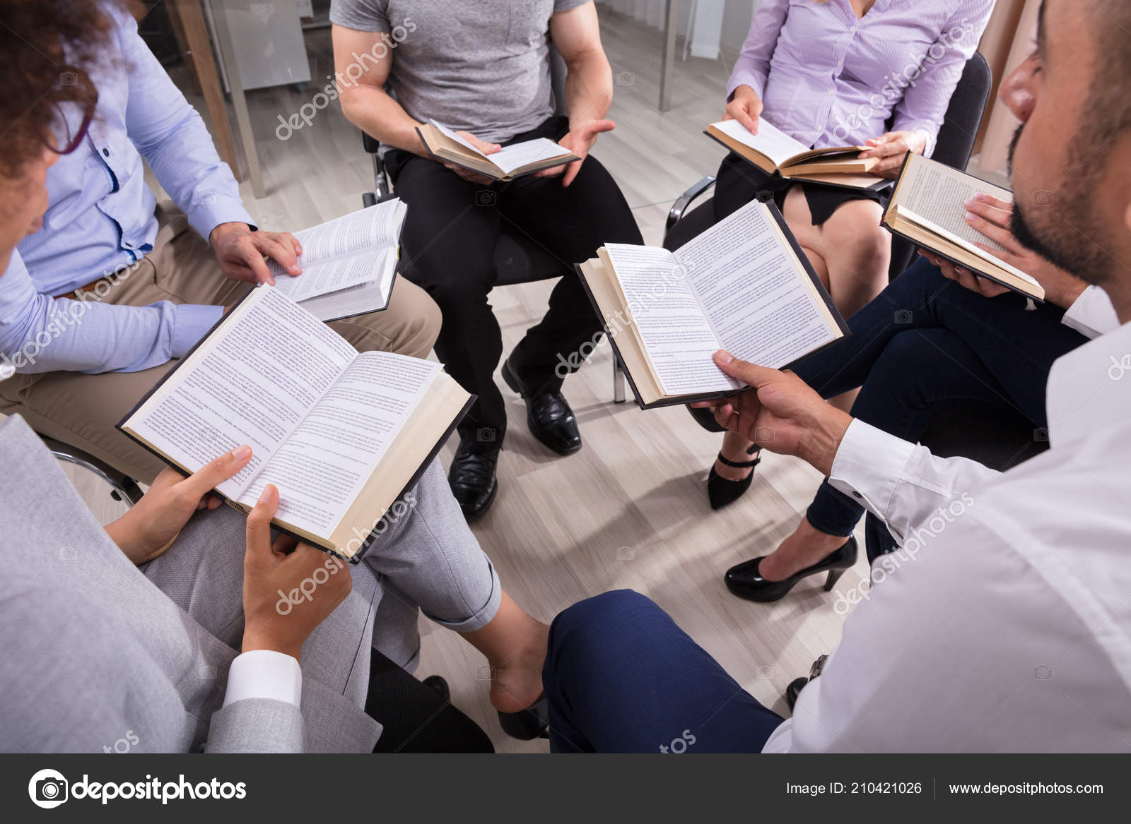 Group Of People Reading Books