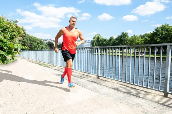 Old man running Pictures, Old man running Stock Photos & Images ...
