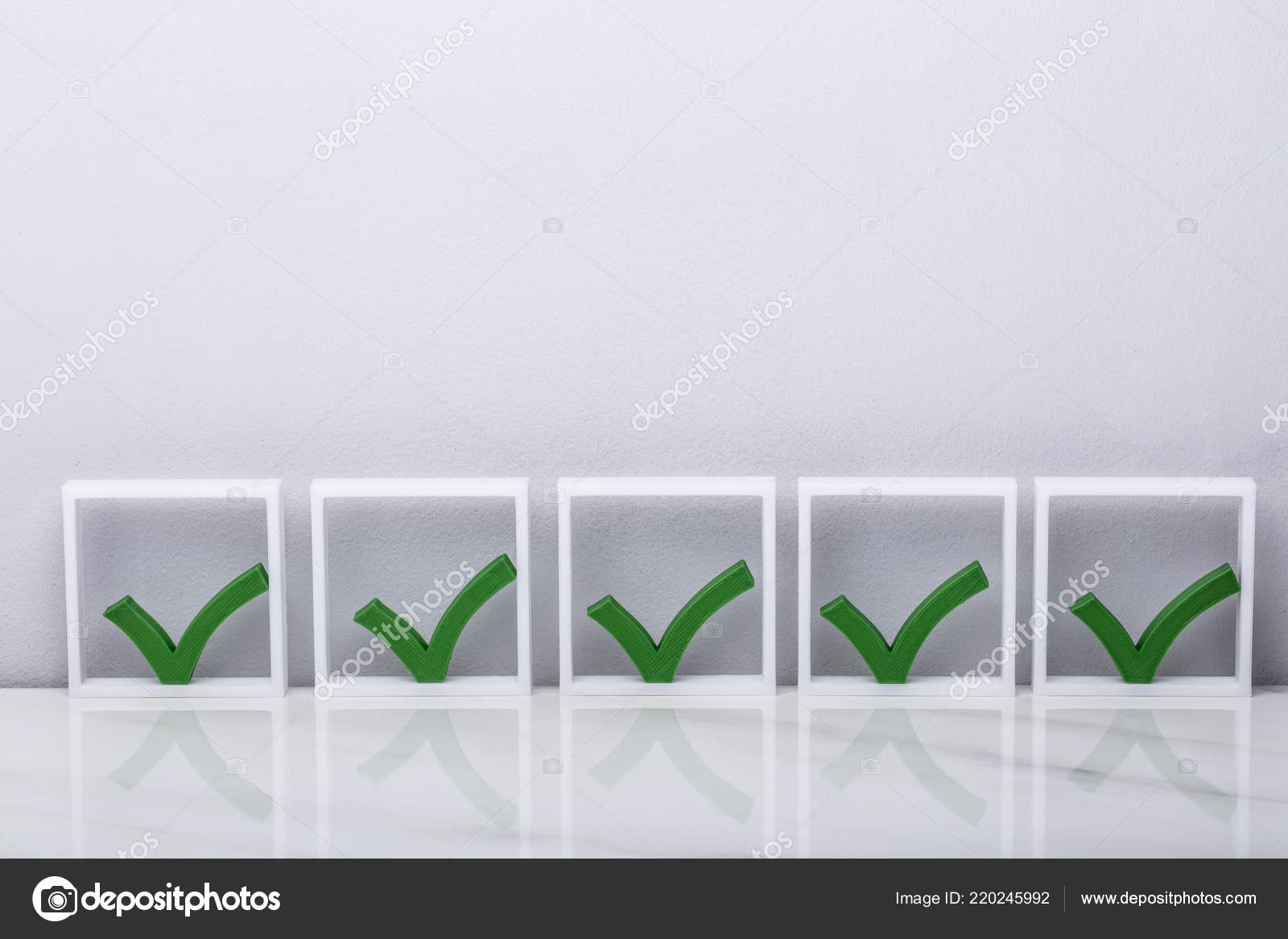 Row Green Check Marks Boxes Reflective Desk — Stock Photo © AndreyPopov ...