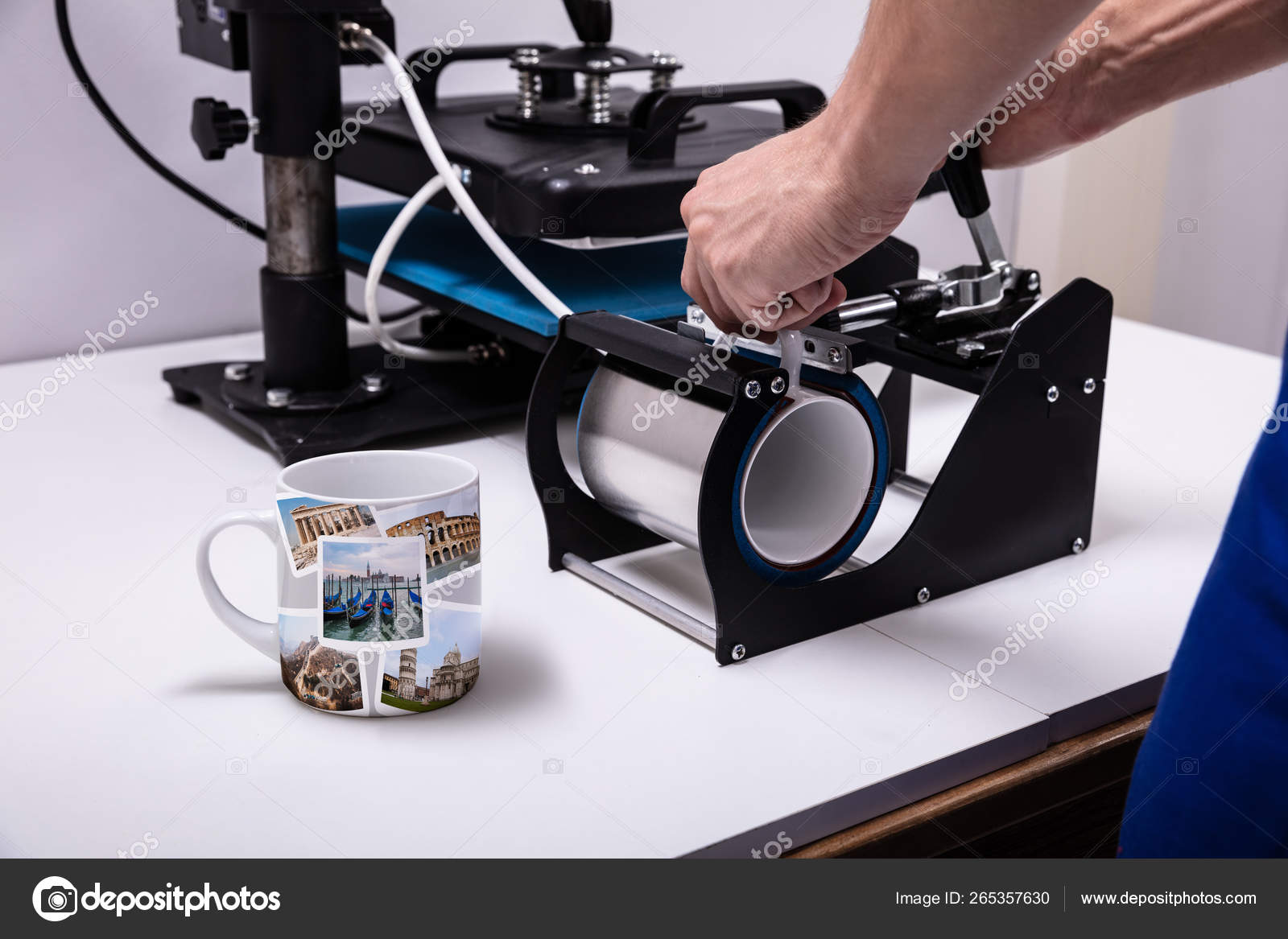 Man Printing Coffee Mugs Workshop Stock Photo by ©AndreyPopov 265357630