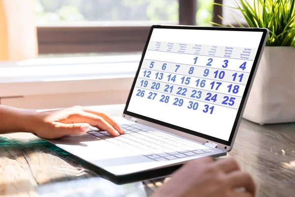 Looking at calendar Stock Photos, Royalty Free Looking at calendar ...