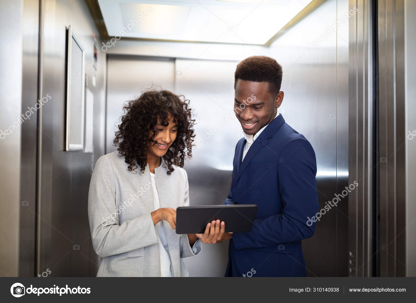 People Standing In Elevator