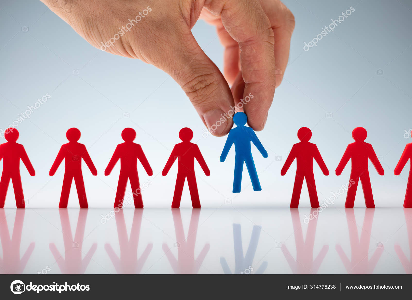 Hand Picking Ideal Job Candidate Row Stock Photo by ©AndreyPopov 314775238