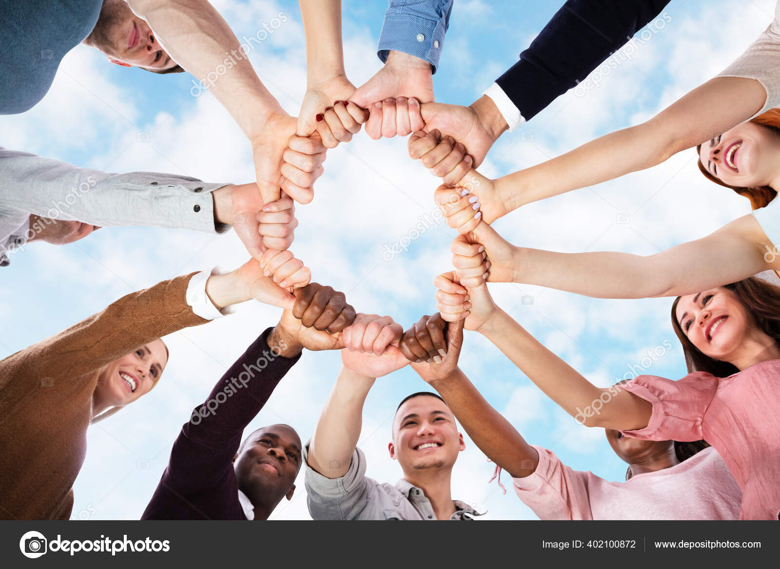 Multicultural Multirracial Huddle Equipo Grupo Personas: fotografía de stock © AndreyPopov ...