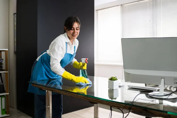 Janitor Cleaning Office Desk. Hygiene Cleaner Service - Stock Image ...