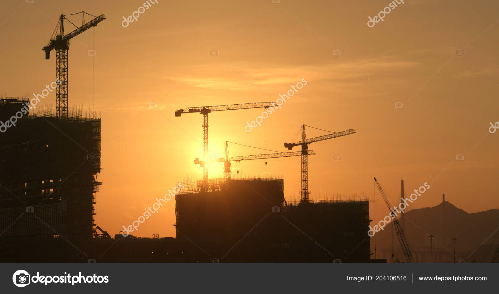 Silhouette Construction Site Sunset Stock Photo by ©leungchopan 204106816