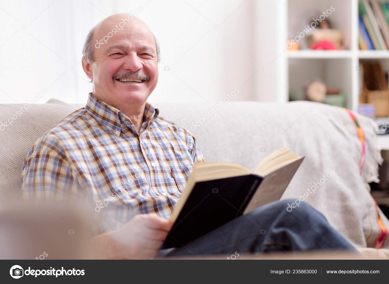 Senior Man Reading Book Smiling Looking Camera Sitting His Sofa — Stock ...