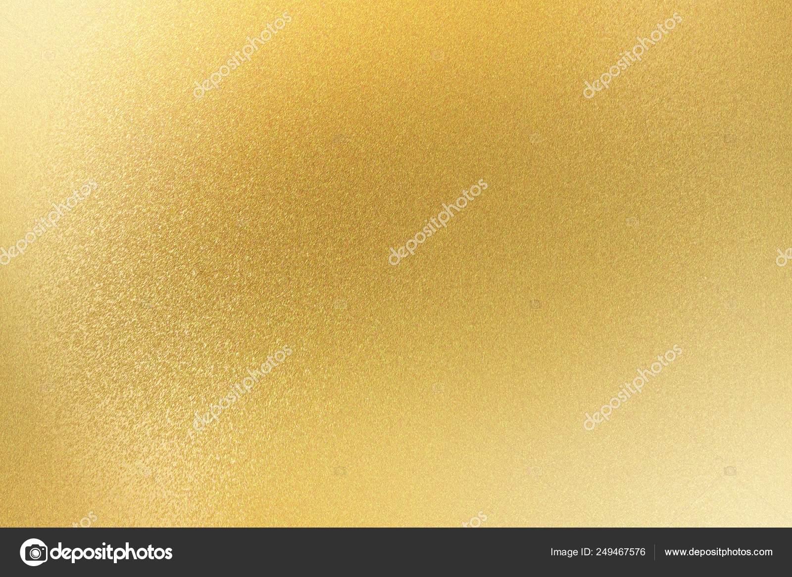 Light Shining On Rough Gold Metal Sheet Texture Abstract
