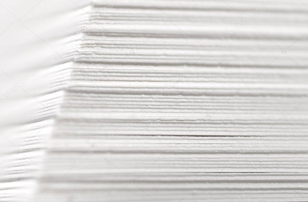 primer plano de pila de papel blanco con poca profundidad de campo DOF 2023