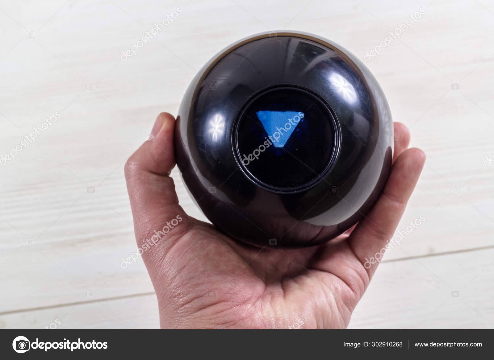 Magic prediction eight ball in hand. Stock Photo by ©Alex_Ishchenko ...