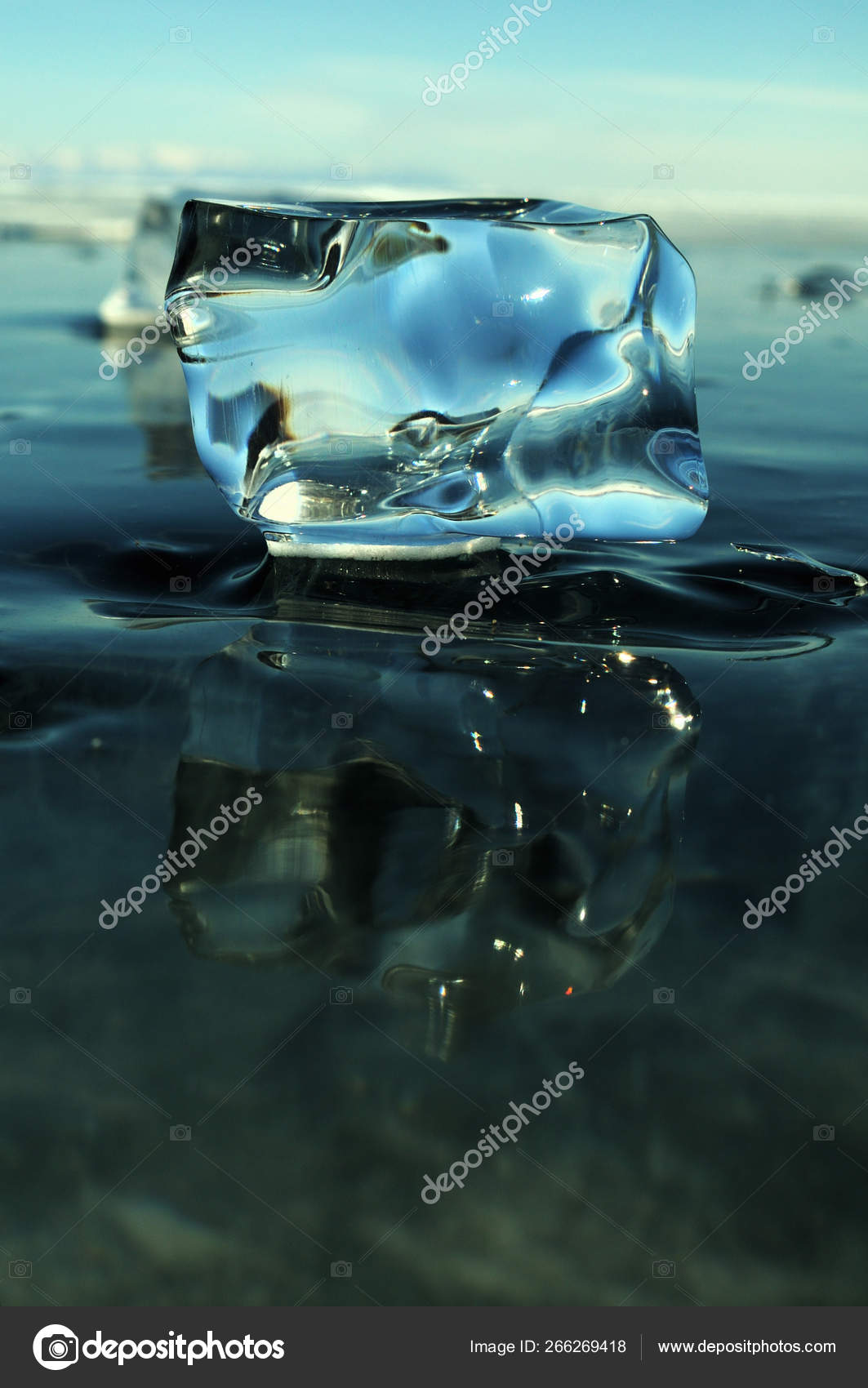 Ice Cube Melting In The Sun