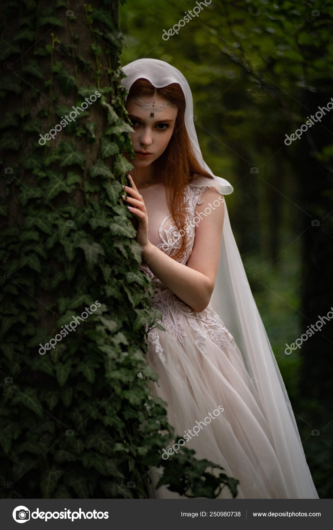 Attractive Ginger Elf Woman White Dress Cape Posing Green Garden Stock ...
