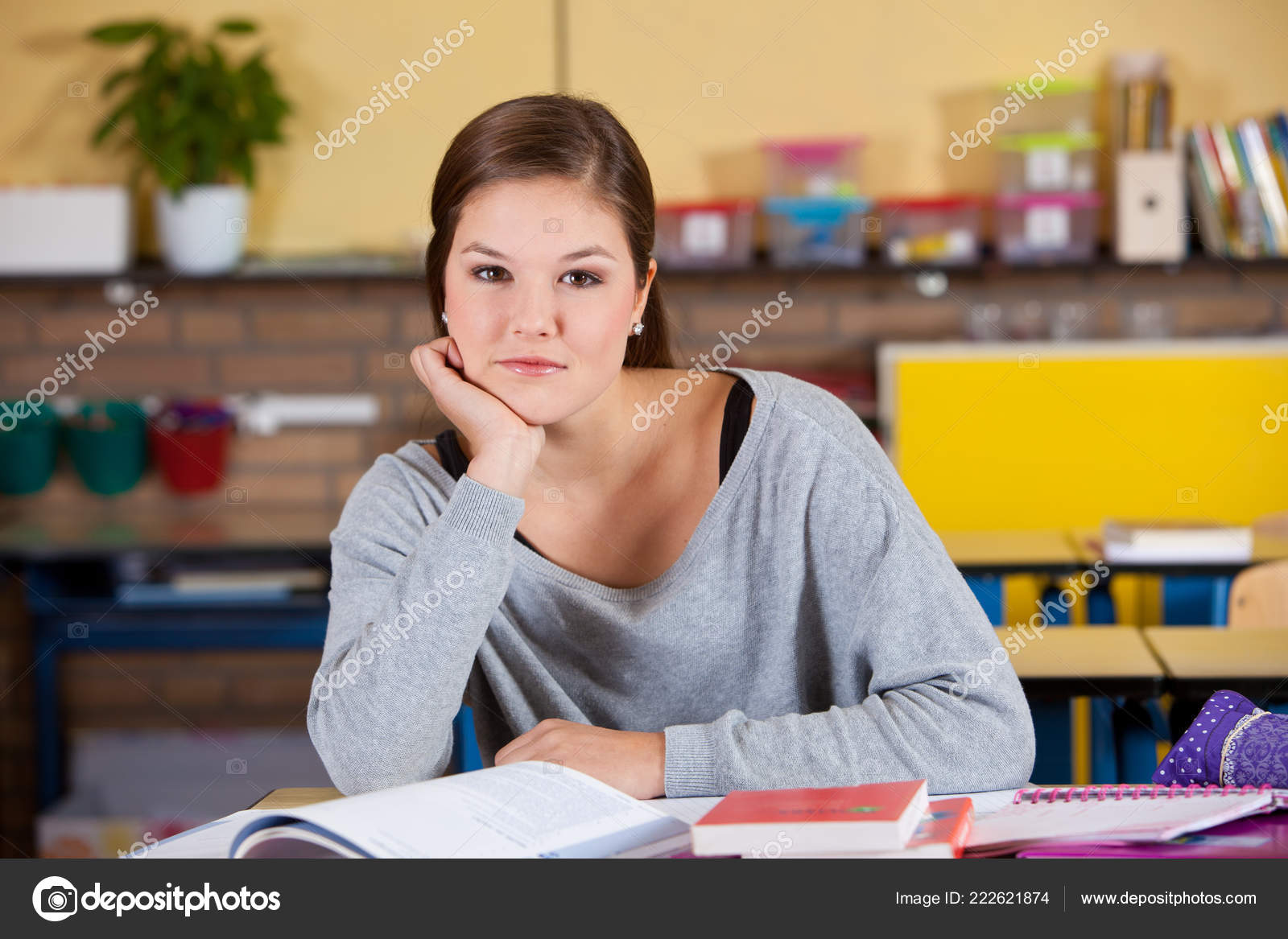 Young Student Leaning Desk Classroom Stock Photo by ©Fotosmurf 222621874