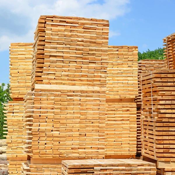 stack of wood planks in the warehouse - Stock Image - Everypixel