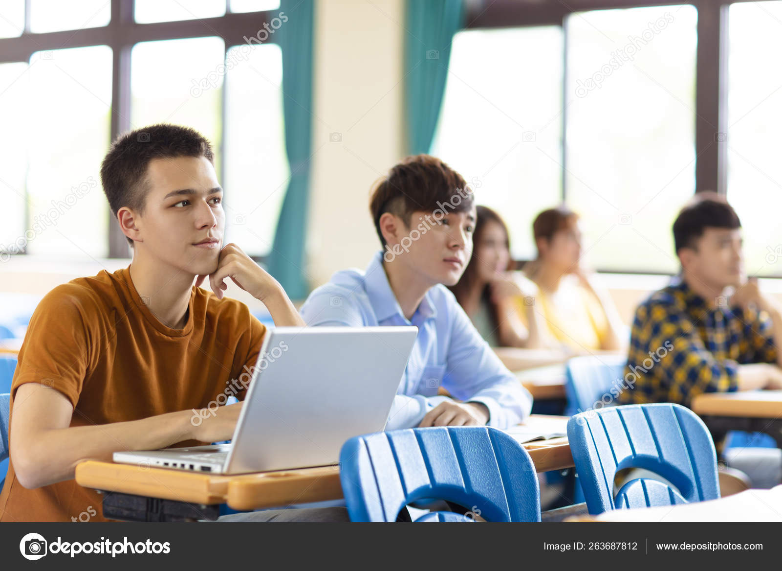 College Students Studying In Class