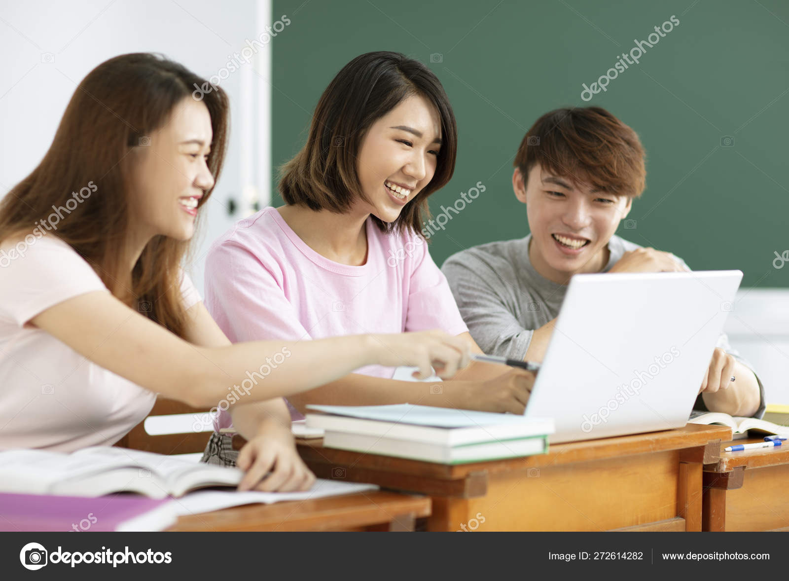 Happy College Students In Classroom