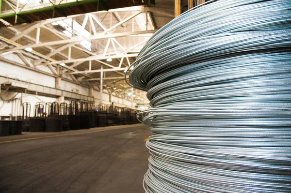 Machines, equipment and coils with wire. Wire production plant - Stock ...