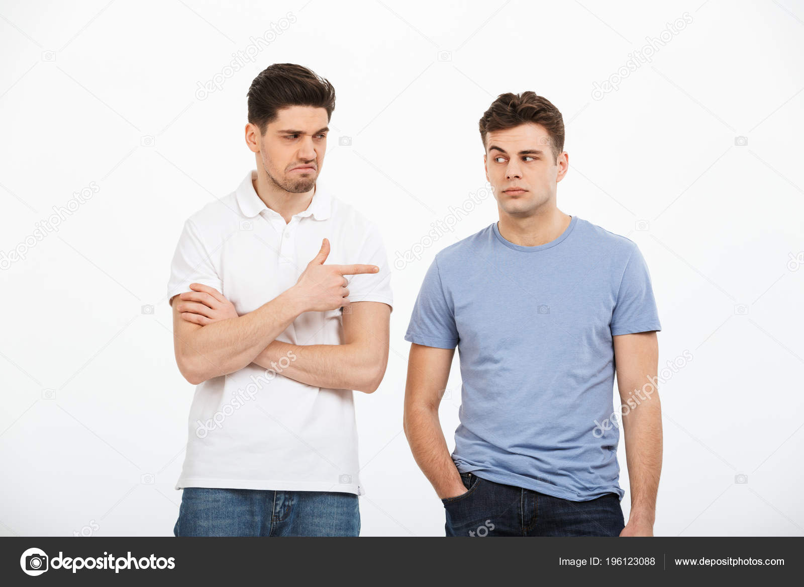 Portrait Two Disappointed Young Men Pointing Finger Isolated White ...