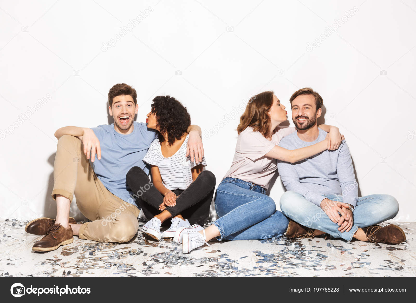 Group Happy Multiracial People Sitting Floor Confetti Hugging Isolated ...