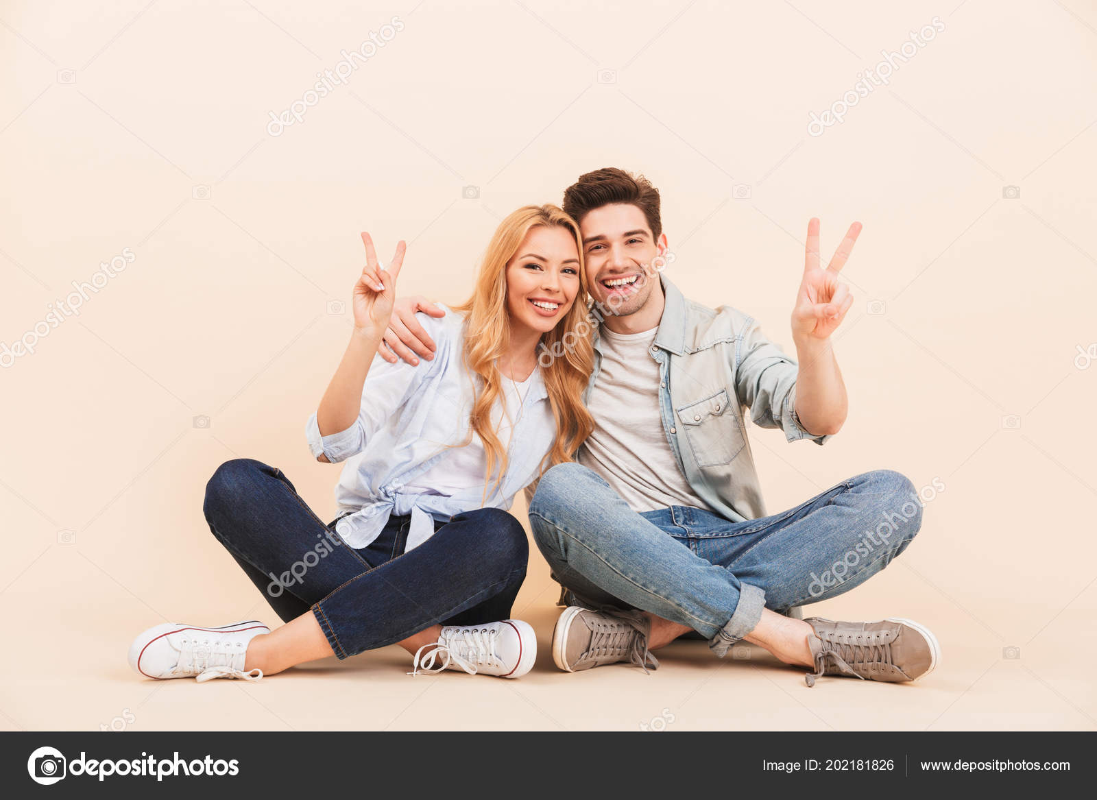Image Pleased Man Woman Hugging Together While Sitting Floor Legs Stock ...
