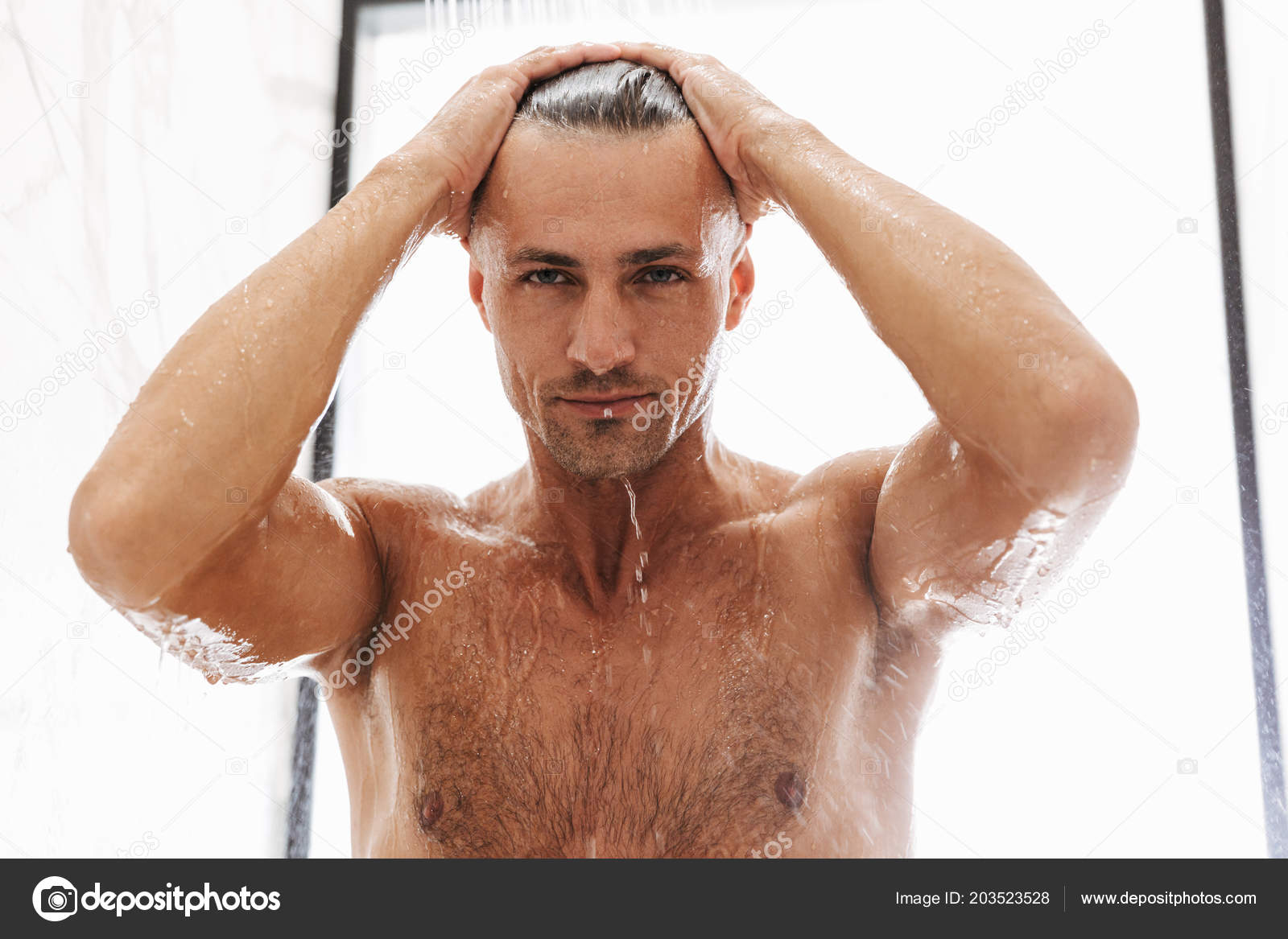 Sexy Musculoso Hombre Tomando Una Ducha: fotografía de stock © Vadymvdrobot #203523528 ...