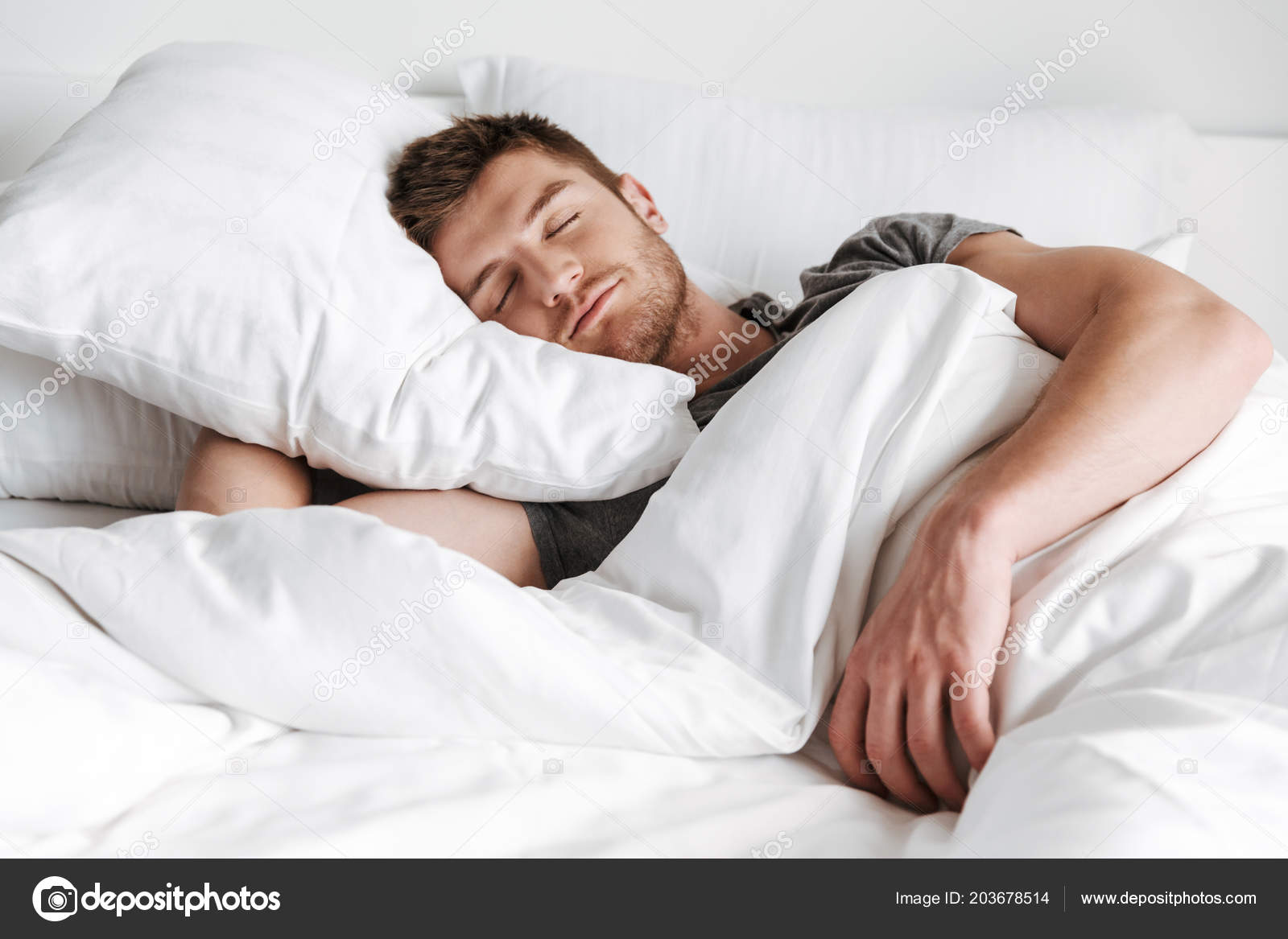 Handsome Young Man Sleeping Bed Home Stock Photo by ©Vadymvdrobot 203678514