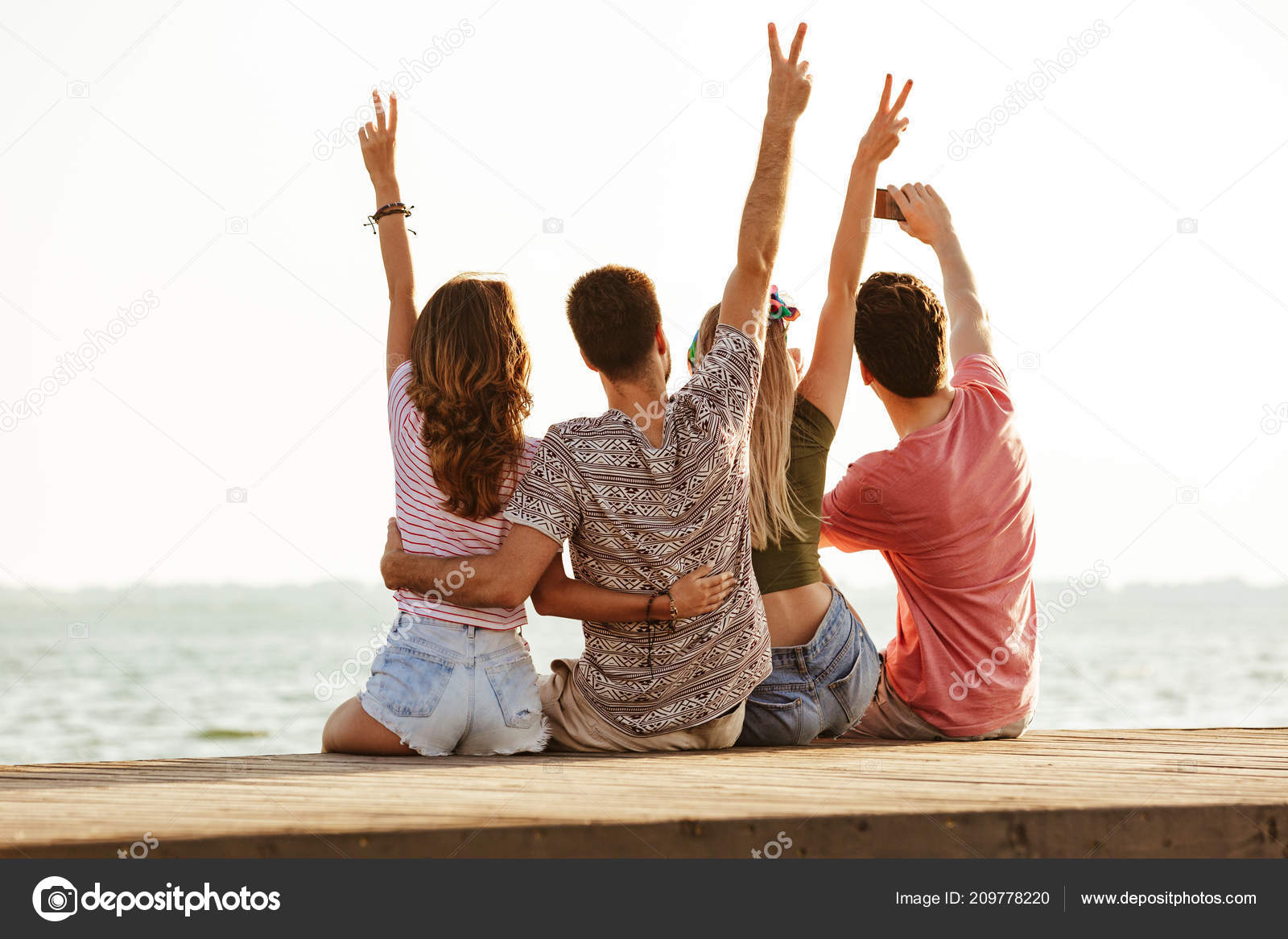 Four Friends Holding Hands