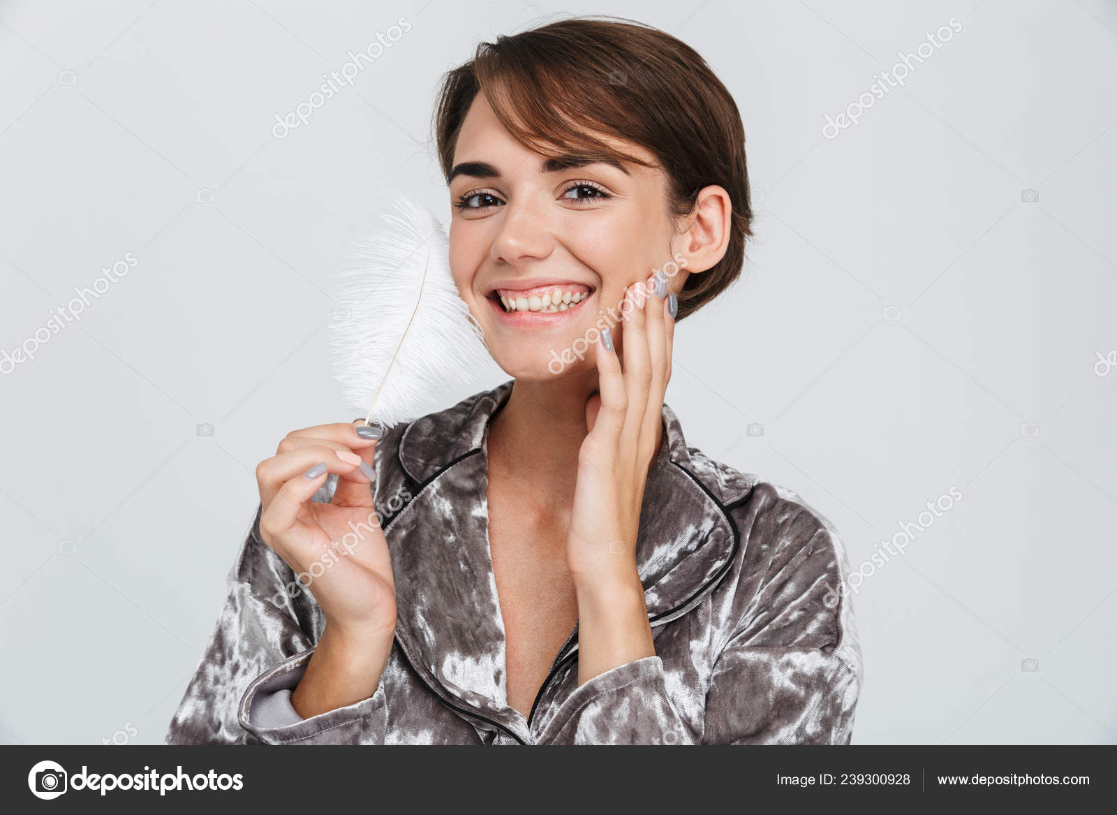 Pretty Young Girl Wearing Pajamas Holding Feather Isolated Gray ... Pretty Young Girl Wearing Pajamas Holding Feather Isolated Gray ...