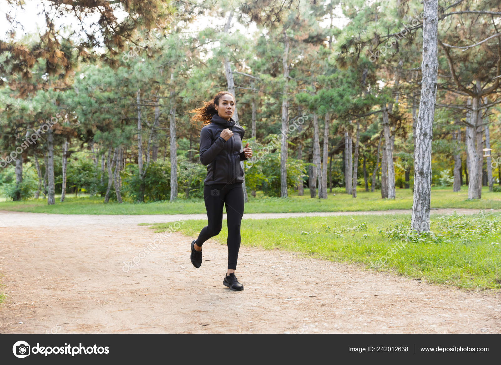 Image Sportswoman 20S Wearing Black Tracksuit Working Out While Running ...