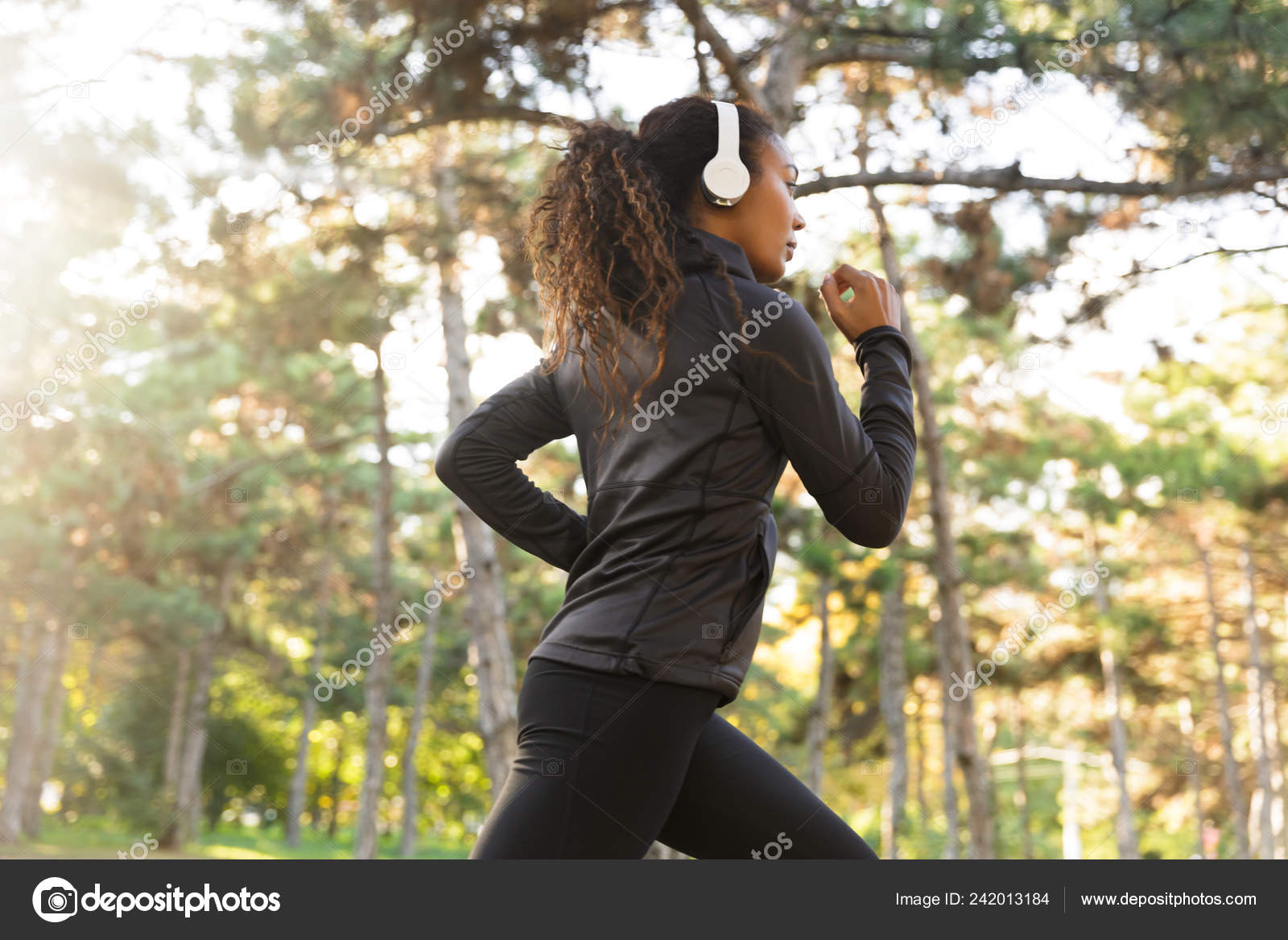 Image Well Built Woman 20S Wearing Black Tracksuit Headphones Working ...