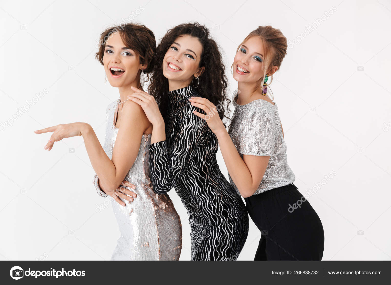 Side view of Happy Three women wearing in shiny clothes Stock Photo by ...