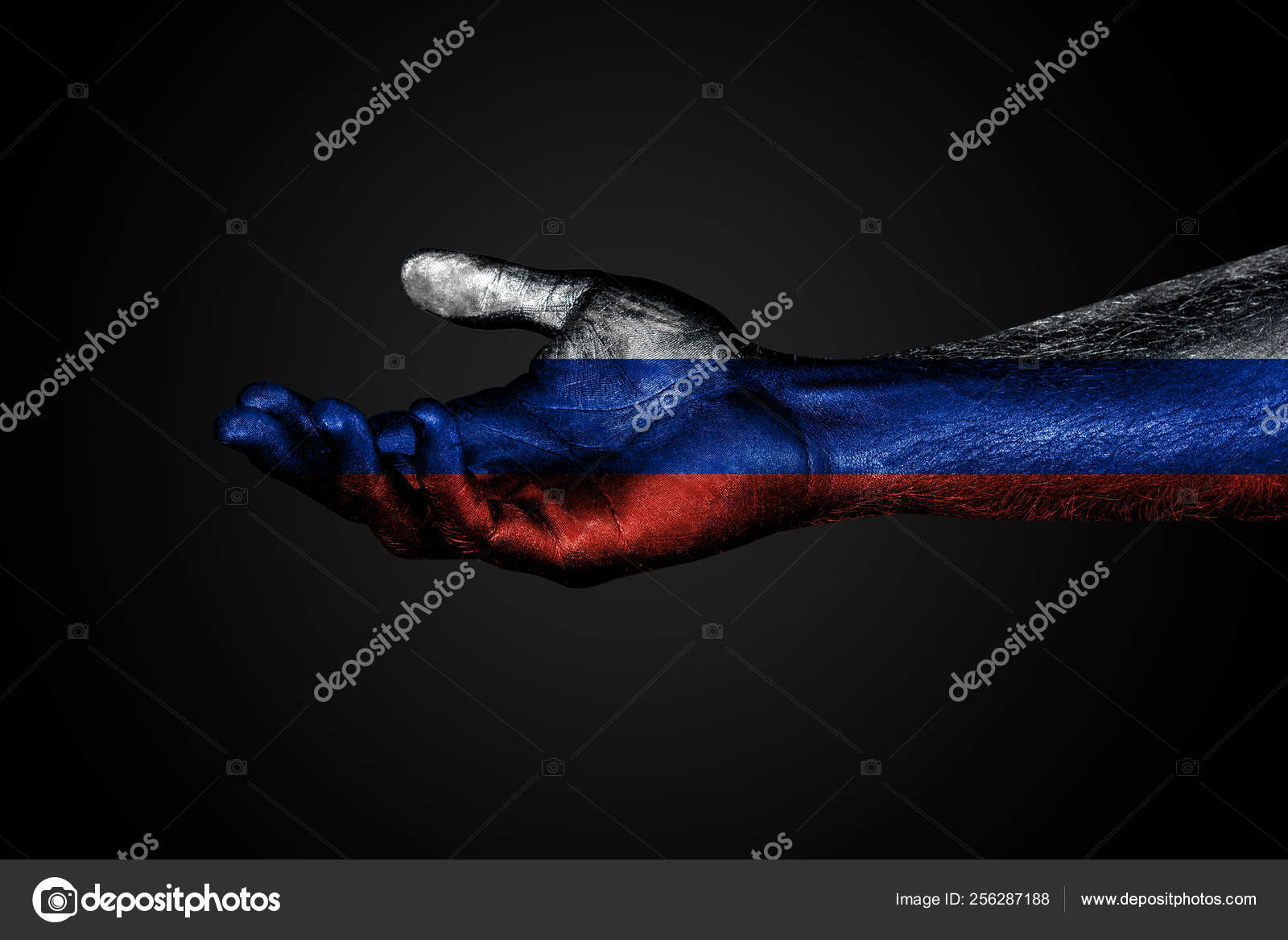 Outstretched hand with a drawn Russia flag, a sign of help or a request ...